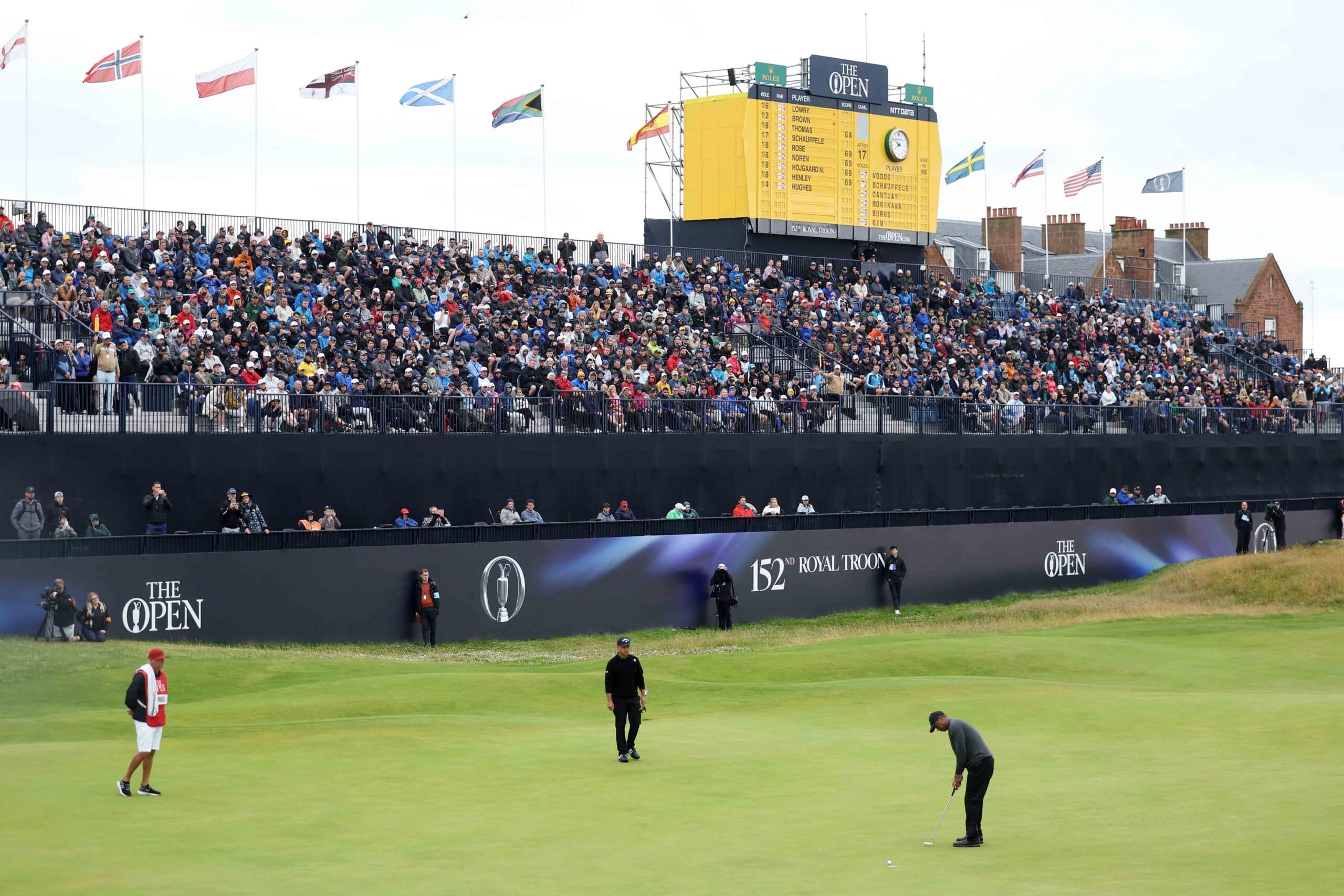 How do players take relief from the big grandstands at The Open?