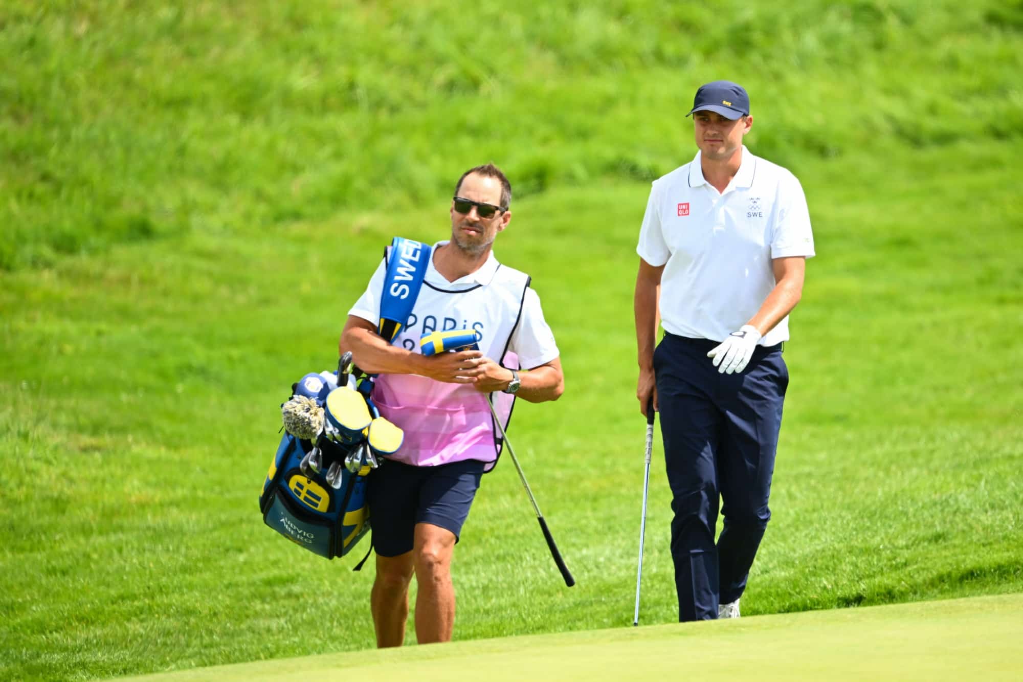 Olympic golf caddies should get gold medals. Everyone else does!