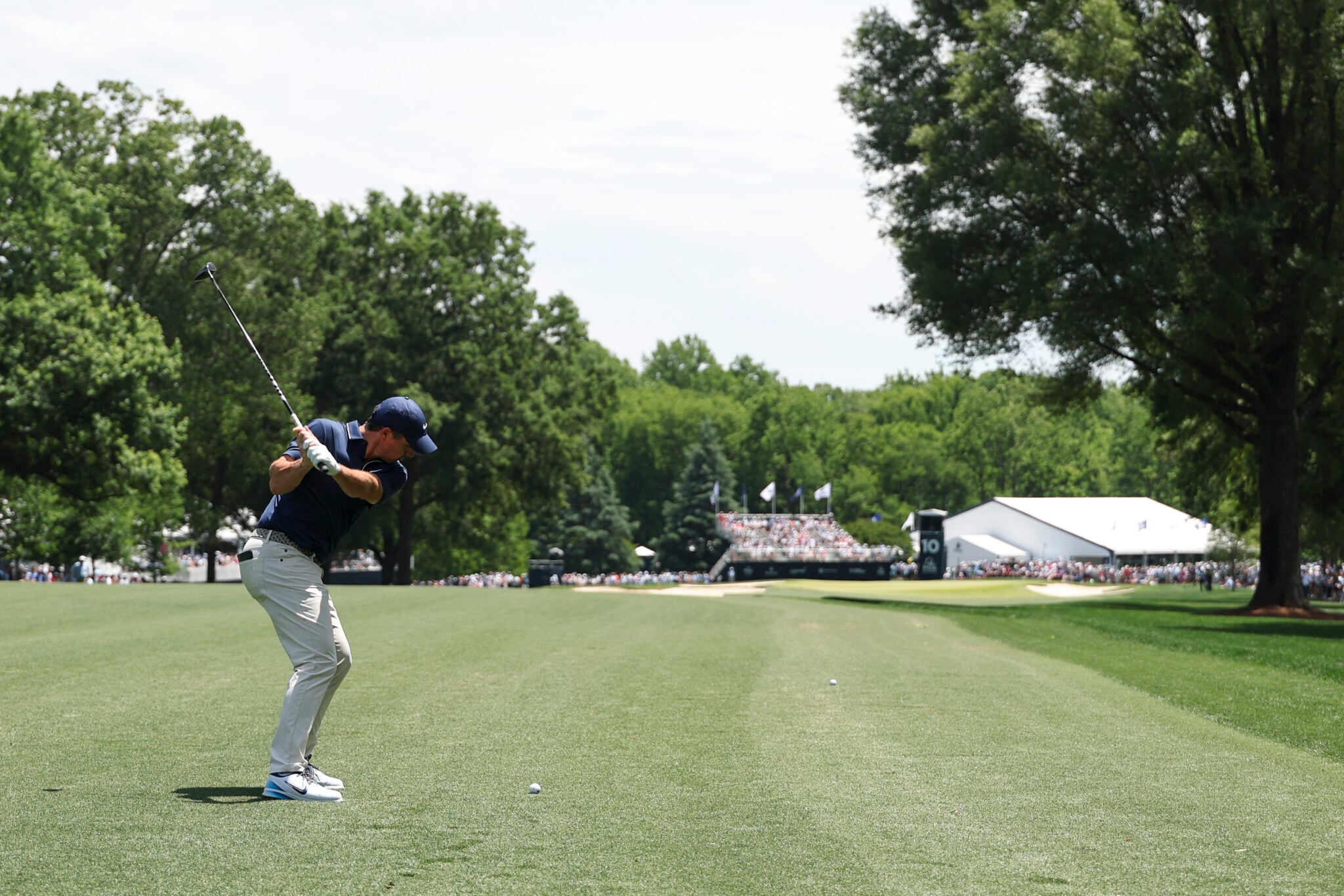 What time does Rory McIlroy tee off at the RBC Canadian Open?